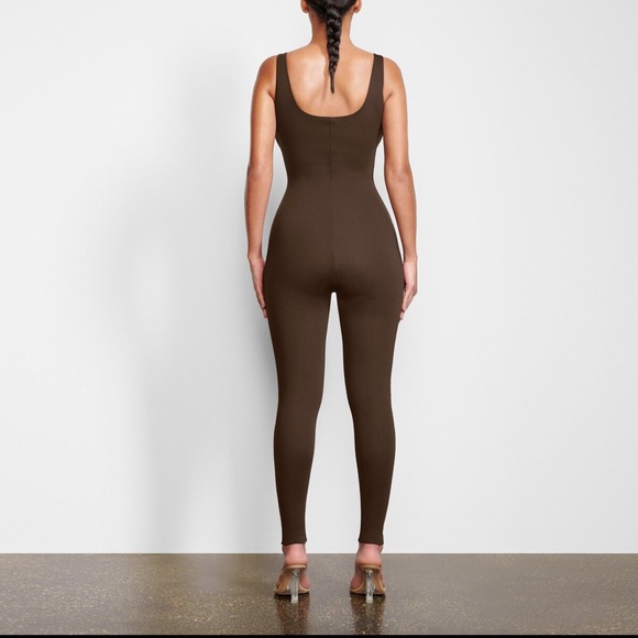 SKIMS | Pants & Jumpsuits | Skims All In One Scoop Neck Onesie In Cocoa ...